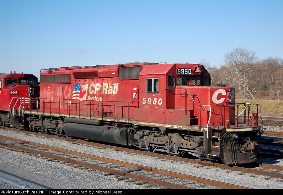 CP 5950 leads a train into River Yard